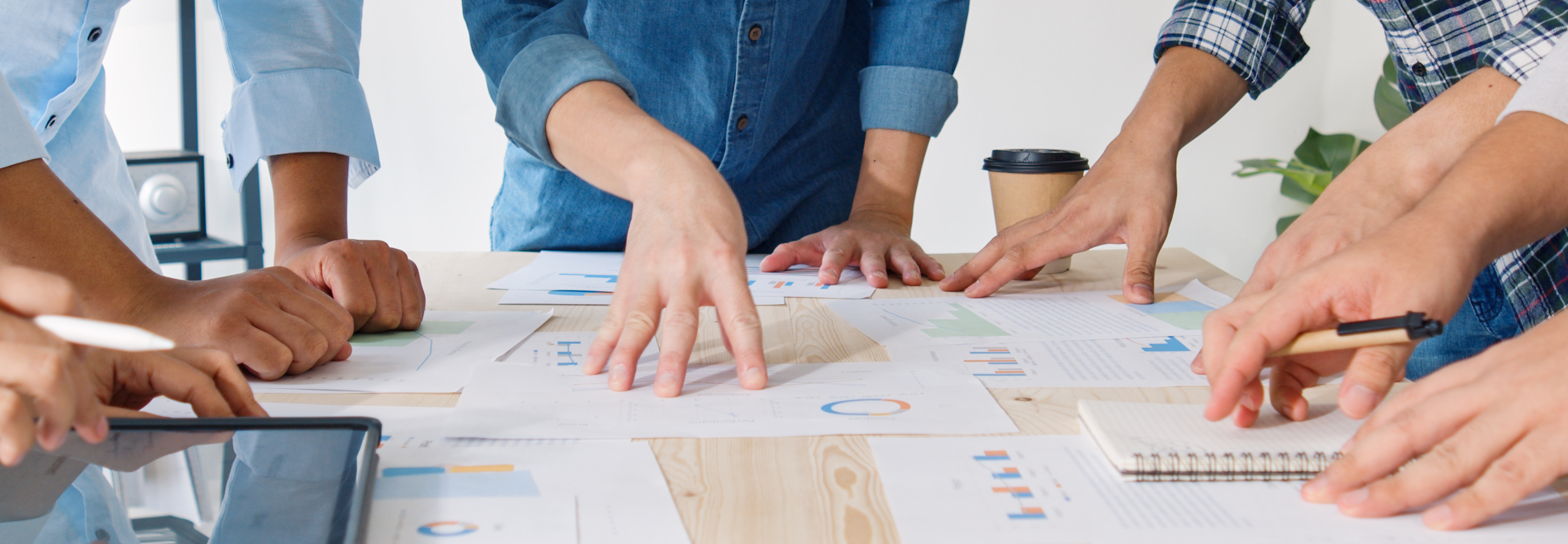 Young Asian business financial team work together in project brainstorm ...